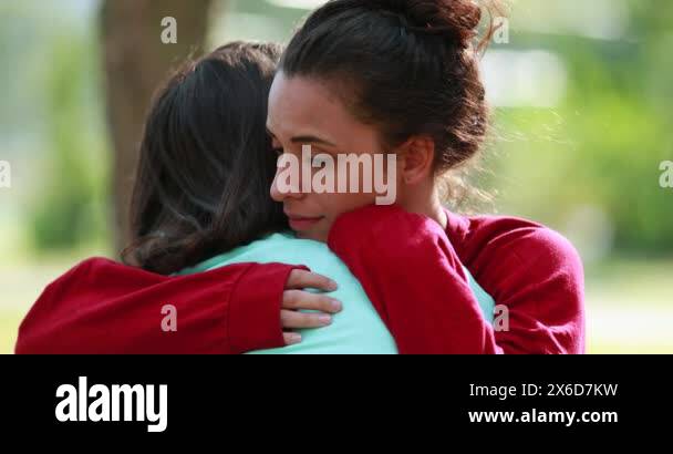 Empathy concept. Two women friendship embrace. Friend consoling partner ...