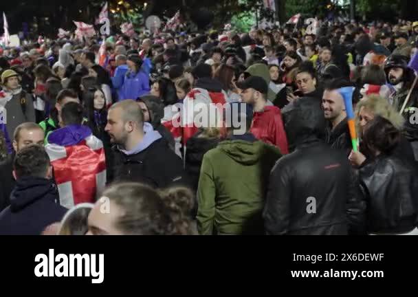 A large crowd gathers at a protest in Tbilisi, Georgia, on the night of ...