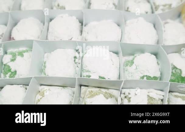 Mochi variants of various colors and flavors such as Pandan, Chocolate ...