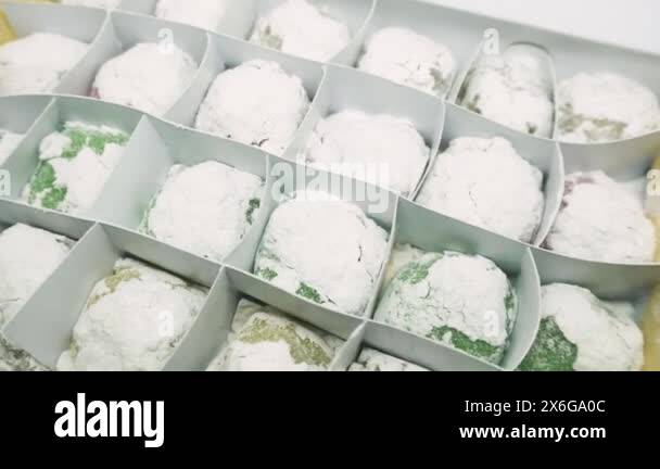 Mochi variants of various colors and flavors such as Pandan, Chocolate ...