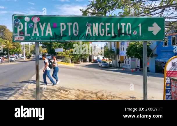 Green Playa Puerto Angelito Beach road street signs and name for ...