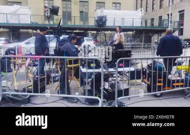 New York, NY, USA 05-13-2024 Panning footage of news reporters and ...