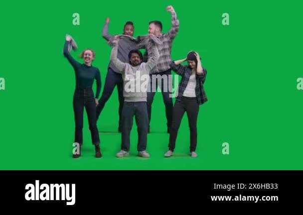 Supportive sports fans gesture and shout while watching football match ...