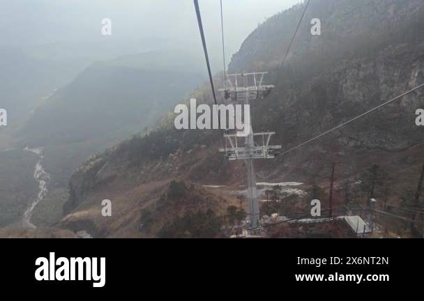 Yunnan, China: April 23, 2024: Looking out the cable car window scene ...