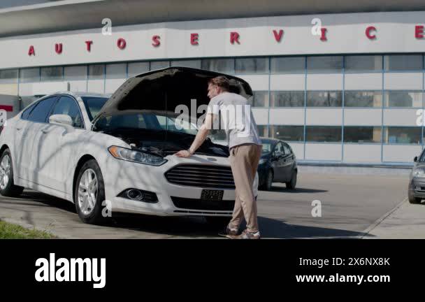 Raised engine hood Stock Videos & Footage - HD and 4K Video Clips - Alamy