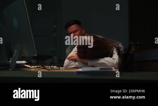 Boss supervising work of ward and shouting into bullhorn while sleeping at work 4k movie ...