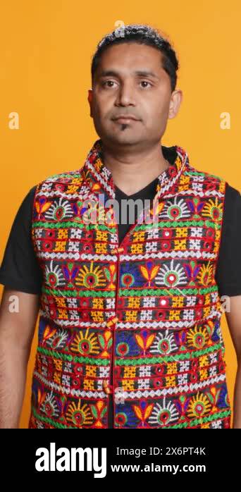 Vertical video Portrait of cheerful friendly indian man smiling ...
