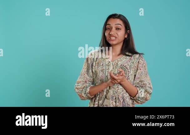 Portrait of envious indian woman mockingly clapping hands, showing ...