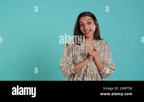 Portrait of jealous indian woman mockingly clapping hands, isolated ...