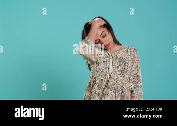 Portrait of cheerful friendly indian woman smiling, flipping long ...
