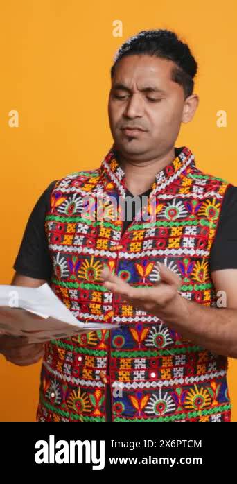 Vertical video Irked manager looking over company financial profit ...