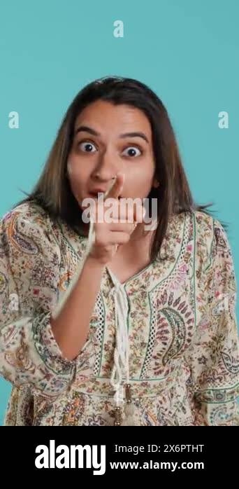 Vertical video Irked indian woman fighting with boyfriend, doing ...