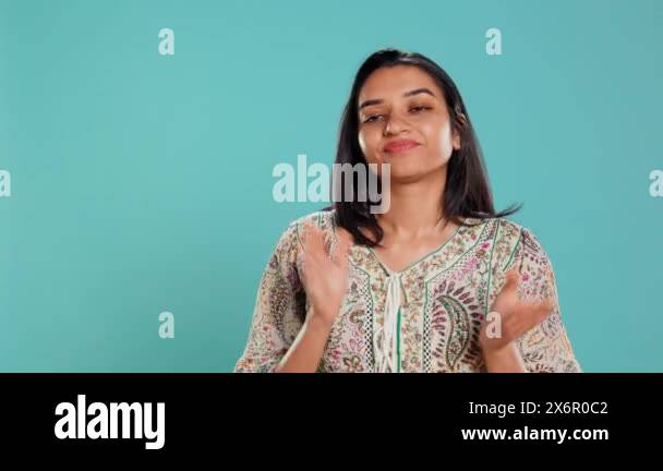Portrait of jealous indian woman mockingly clapping hands, isolated ...