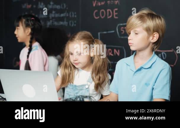 Smart girl using laptop programing engineering code with diverse ...