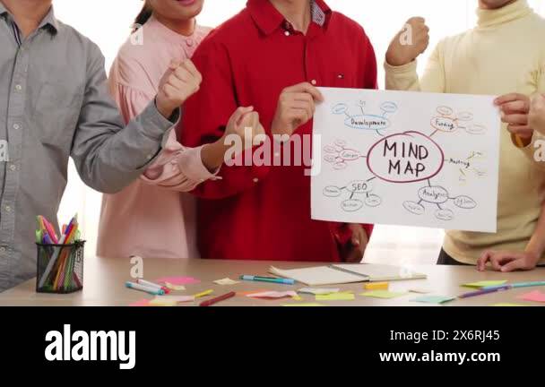 Slow motion successful happy and excited young businesspeople presents ...