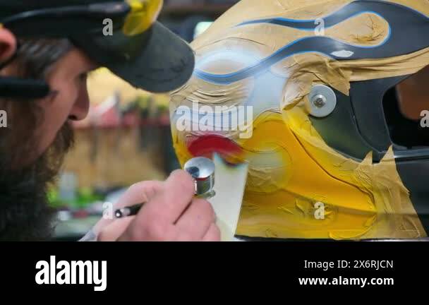 Airbrushing technique using masking of unpainted surface with piece of ...