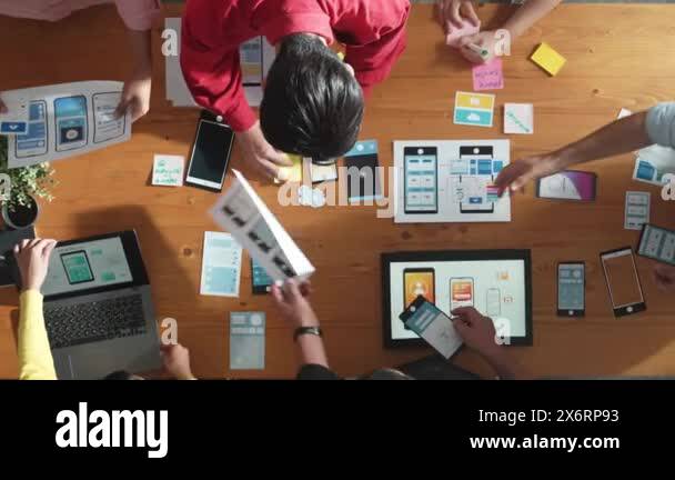 Top view of smart software developer planning software development. Skilled programmer team ...