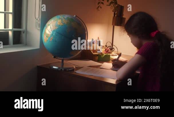 Child doing homework, child studying. Teenage girl wearing studying ...