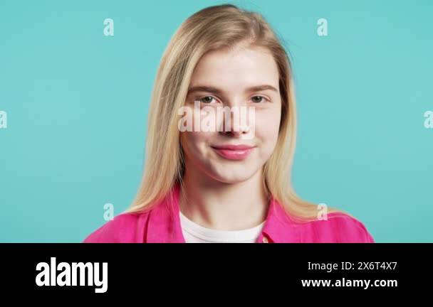 Charming woman in summer outfit showing yes signal, nods head, approve ...