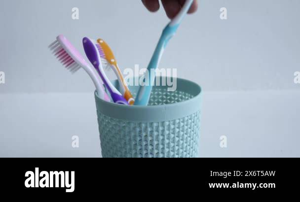 Toothbrushes different colors close Stock Videos & Footage - HD and 4K ...