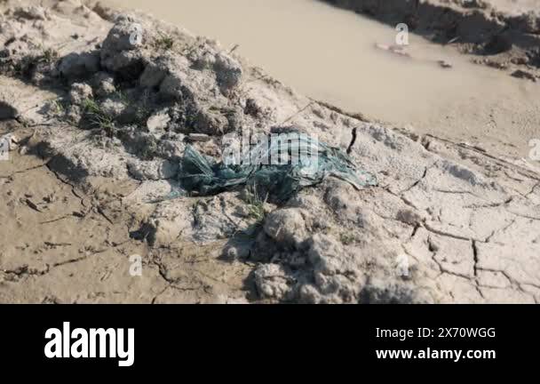 Neglected impact, Arid landscapes, Waste neglect. Refuse finds its way ...