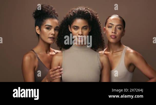 Woman, studio and power with skincare, support and embrace for self ...