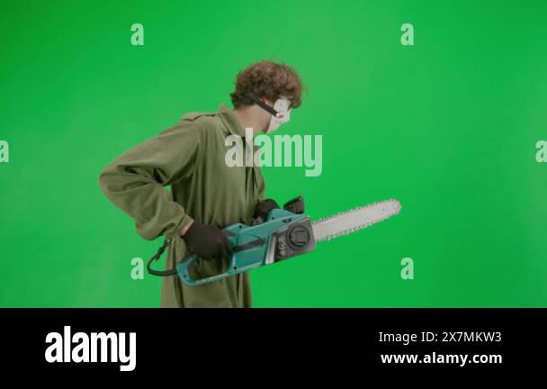 A maniac in a hockey mask and overalls with a chainsaw in his hands ...