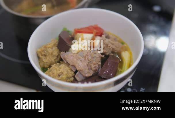 piece of blood in Vietnam food a Vietnamese raw blood dish served with ...