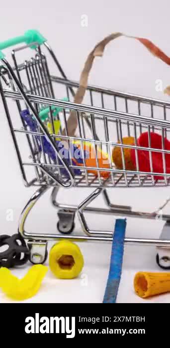 macro stop motion of plastic rubbish and waste items building up in a ...