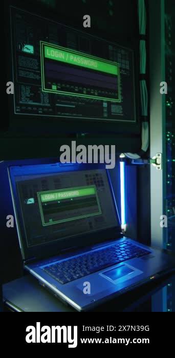 Close up shot of a computer login screen in a modern data center then ...