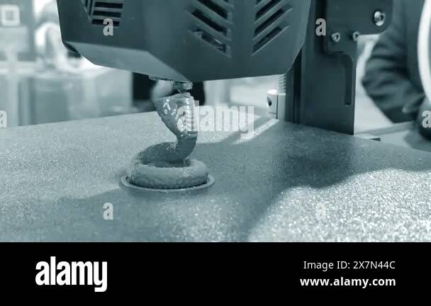 Process of printing object on 3D printer from molten plastic. 3D ...