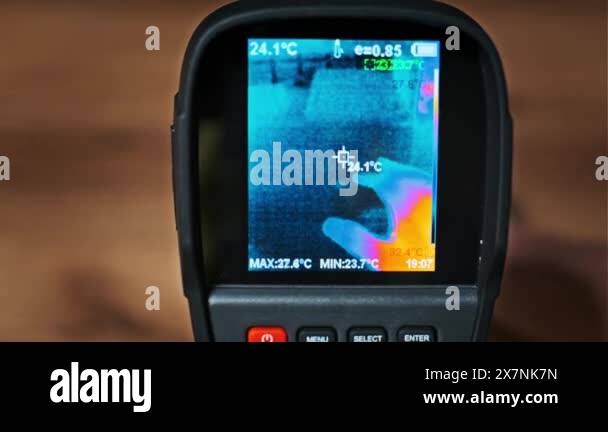 Thermal camera captures heat signature of hand, revealing temperature ...