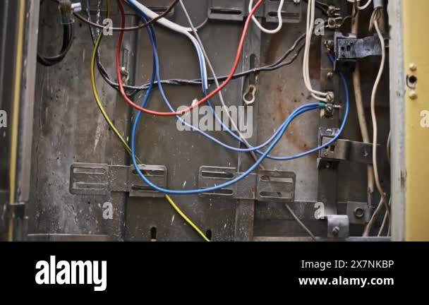 A glimpse into a neglected electrical panel reveals a chaotic ...