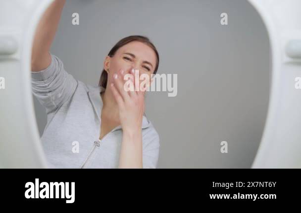 Woman and boy teenager surprised and shocked look into toilet, mother ...