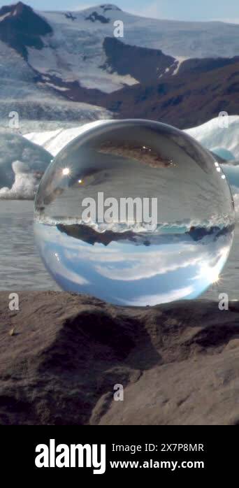 View through the glass sphere to the Fjallsarlon Glacier lagoon ...