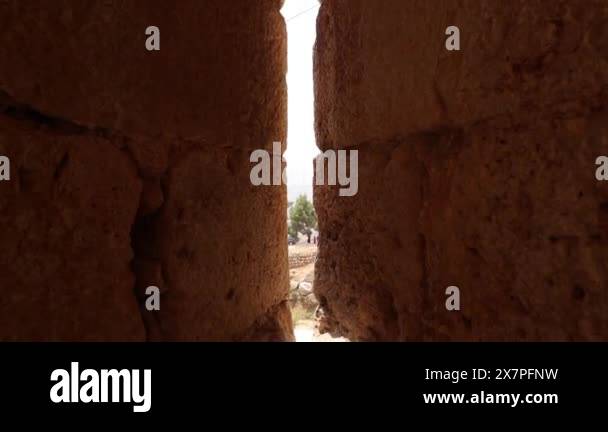 Arrow slits that are wide on the inside and narrow on the outside ...