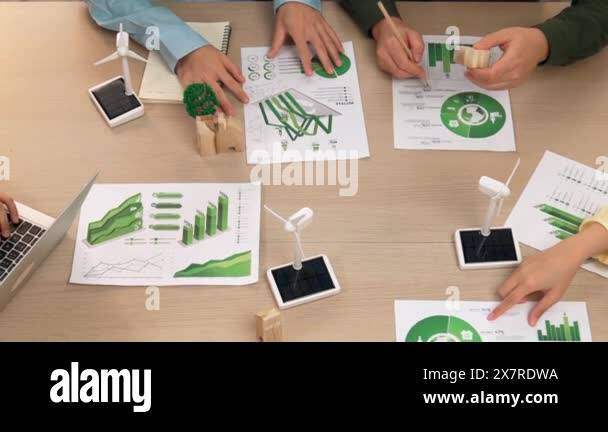 Excellent business team discussing on eco house project at meeting ...