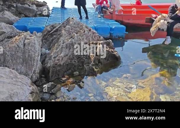 Yunnan,China. April 23,2024: Scene of the pig-trough boats of Mosuo ...
