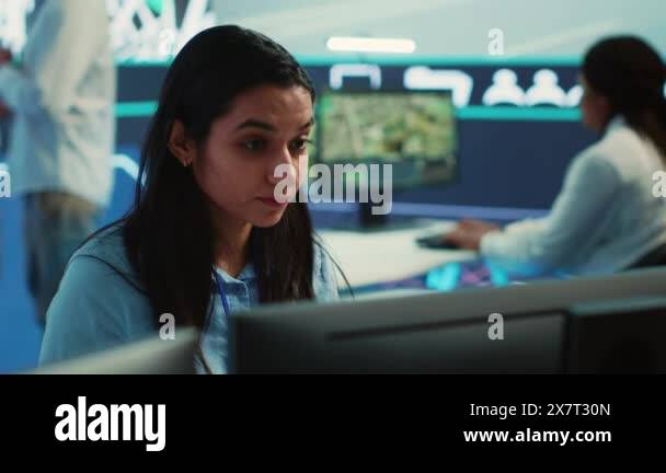 Indian employee monitoring traffic activity and communicating routes to ...