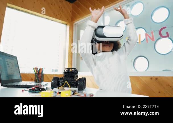 African girl wearing VR vision glasses while raised hand in the air ...