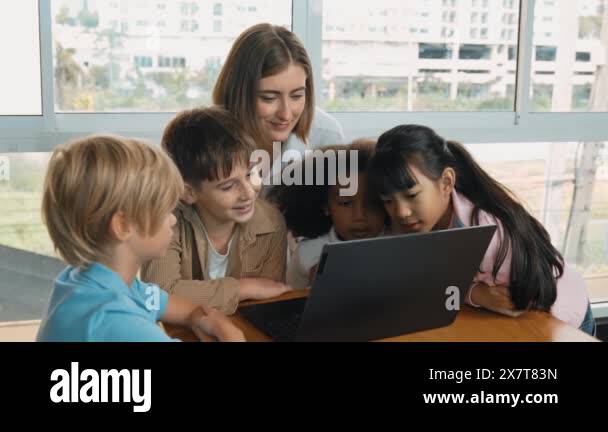 Cute african girl programing system while surround with caucasian ...