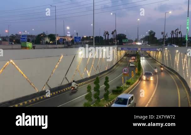View of traffic on main road in city Lahore of Pakistan on May 2, 2024 ...
