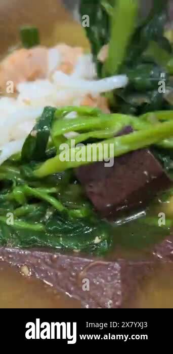 Beef blood soup pieces of blood in soup asian food with glass ...