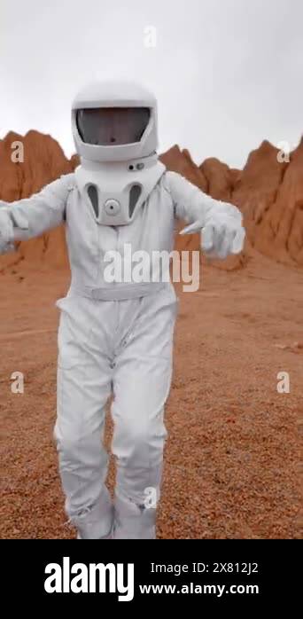 An astronaut dances to the surface of Mars in slow motion. Astronauts ...