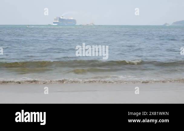 view to the ocean sea with passenger cruise ship tendering in the ocean ...