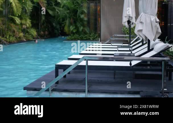 sunbed, Chaise Lounge or swimming pool bed near swimming pool with ...