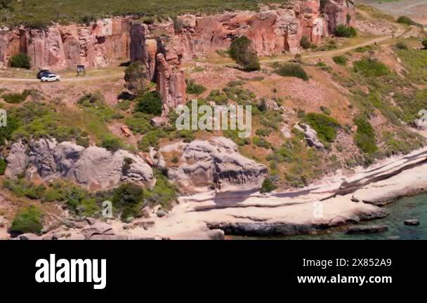 Ayvalik Sarimsakli beach and ancient quarry unique rock shapes sea blue ...