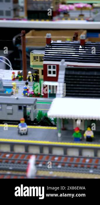 a city completely made of Lego blocks houses cars streets trains trams ...