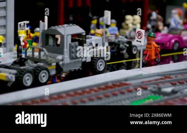 a city completely made of Lego blocks houses cars streets trains trams ...