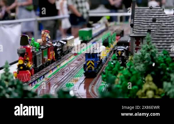 a city completely made of Lego blocks houses cars streets trains trams ...